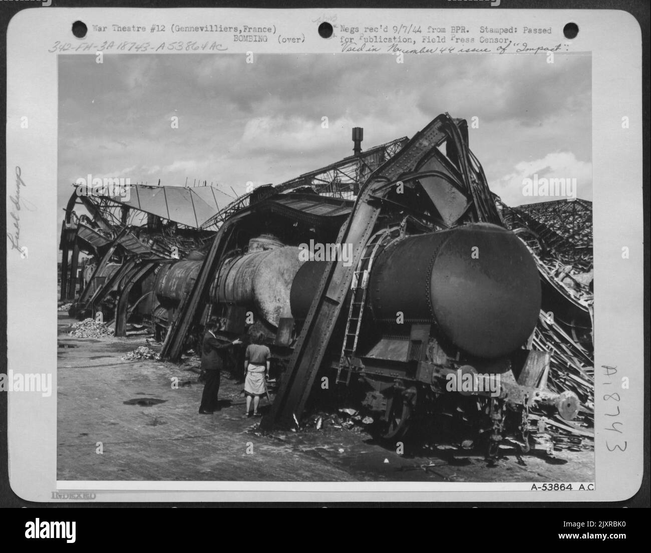 The roof of a grease manufacturing shop collapsed over a rail siding ...