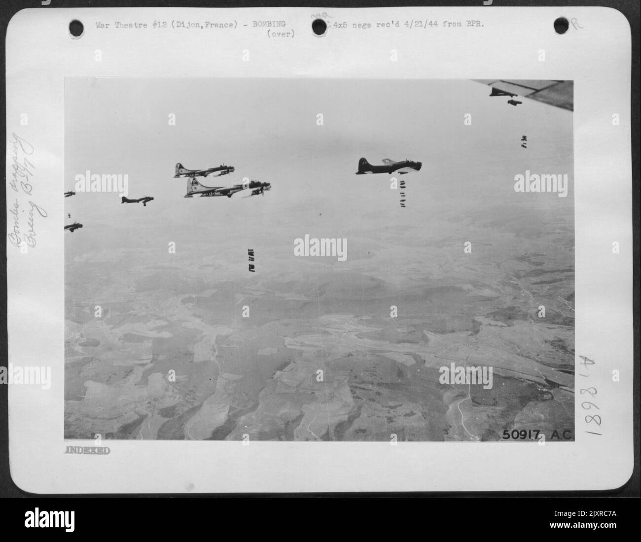 Bombs from Boeing B-17 Flying Fortresses dropping on Dijon Stock Photo ...