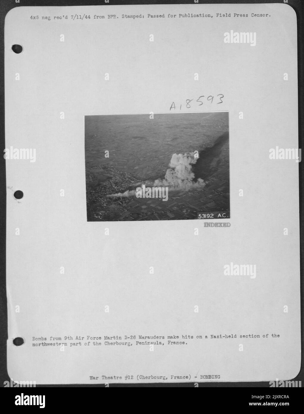 Bombs from 9th Air Force Martin B-26 Marauders make hits on a Nazi-held ...