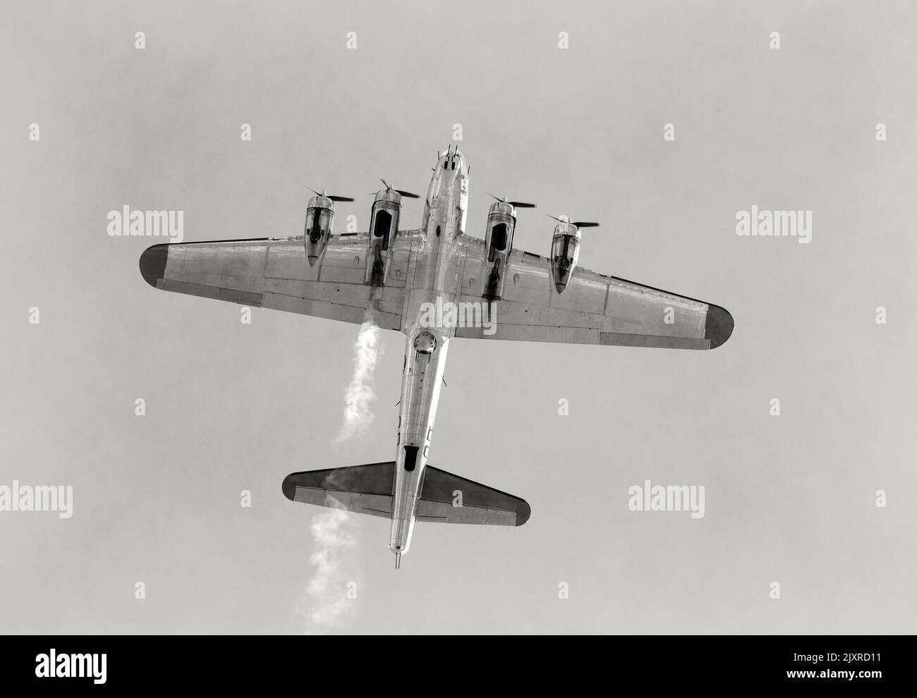 World War 2 Flying Fortress bomber on a mission with engine fire Stock ...