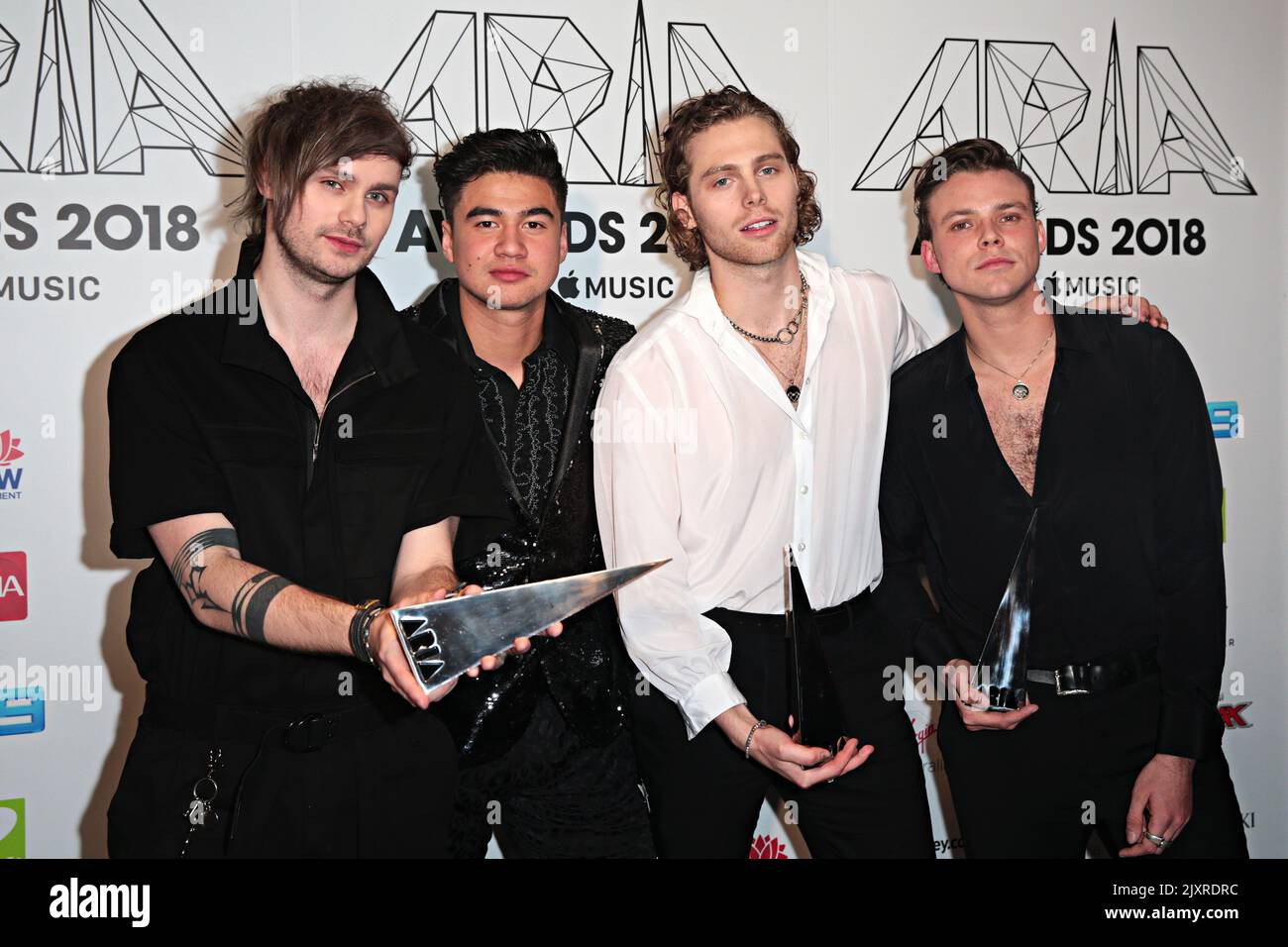5 Seconds of Summer (5SOS) pose for a photograph after winning the Best ...