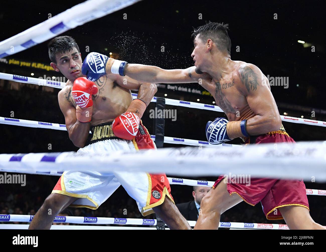 Cameron Hammond (left) of Australia is hit by Frank Rojas (right) of ...