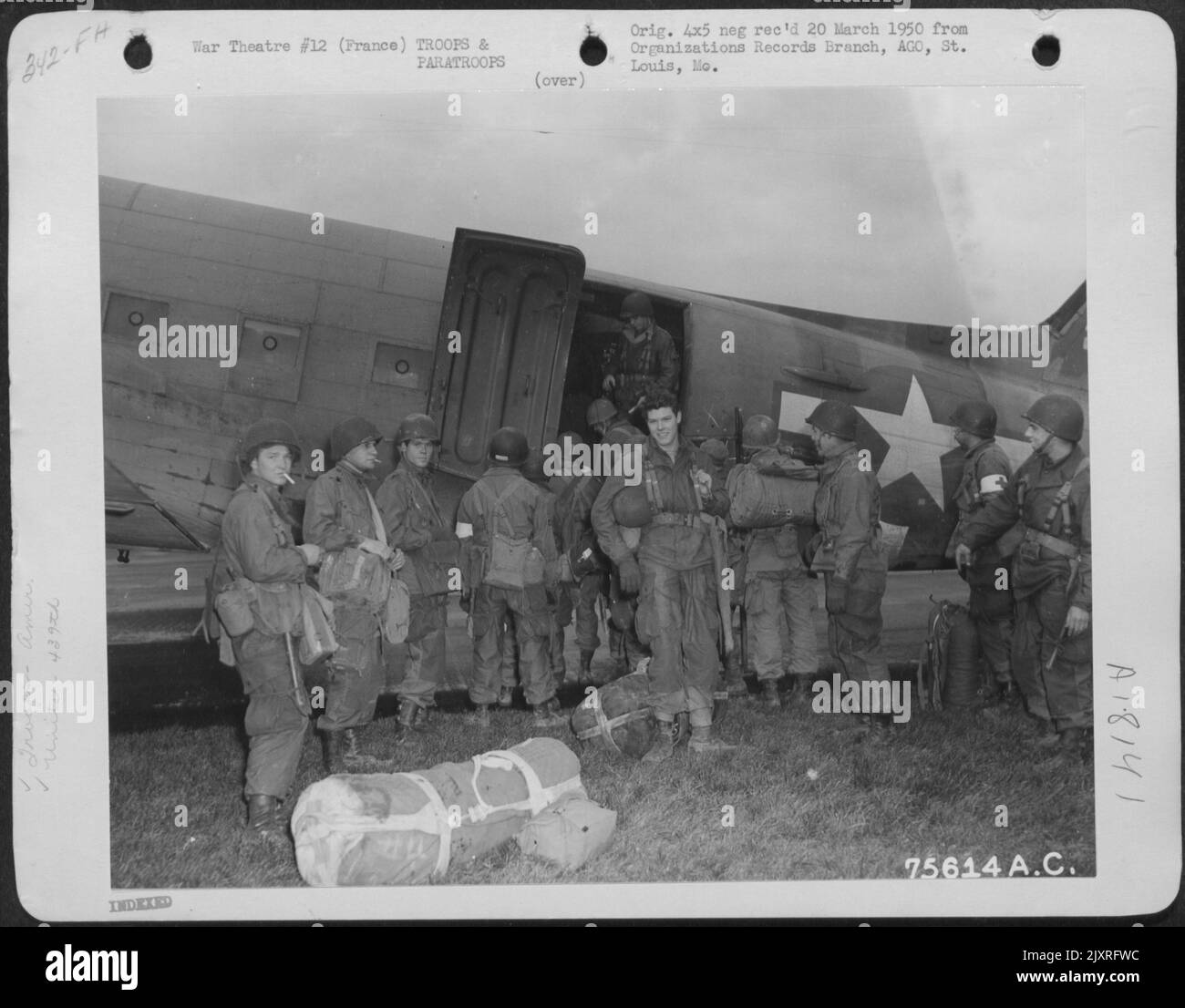 Members Of The 439Th Troop Carrier Group Assemble Their Equipment Prior ...