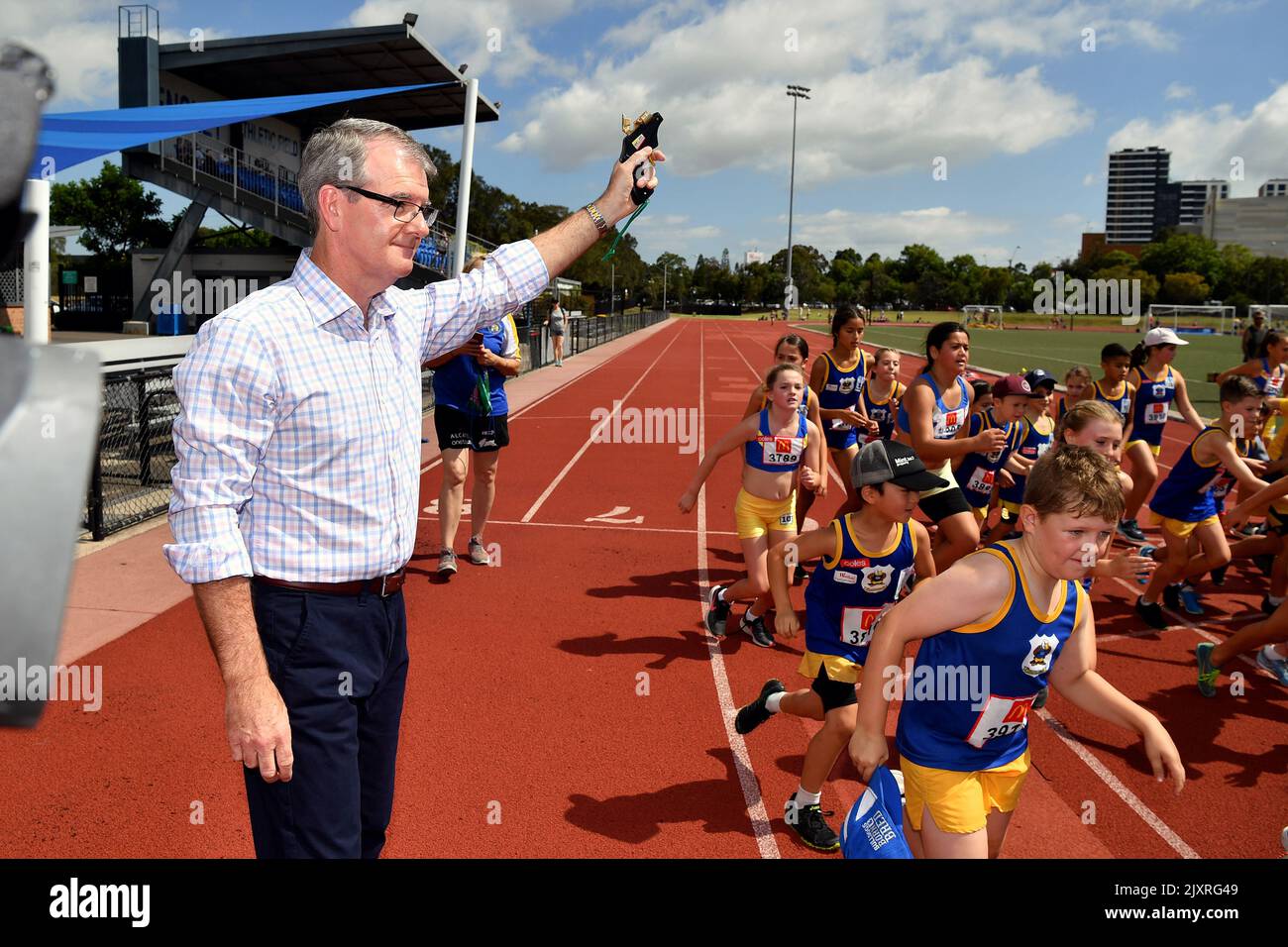 NSW Opposition Leader Michael Daley fires the starters gun for runners ...