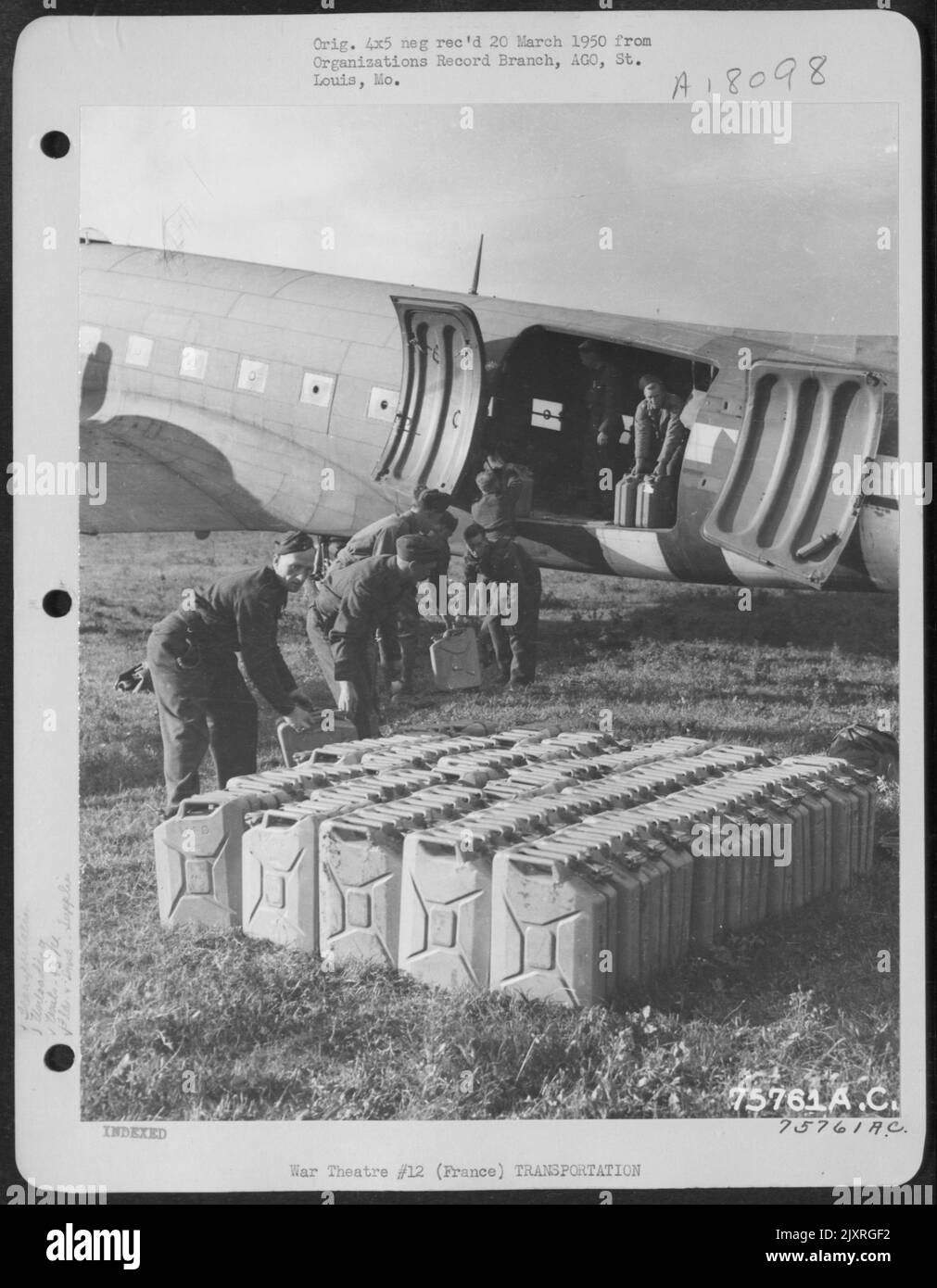Members Of The 439Th Troop Carrier Group Stack Gas Cans On An Airfield ...