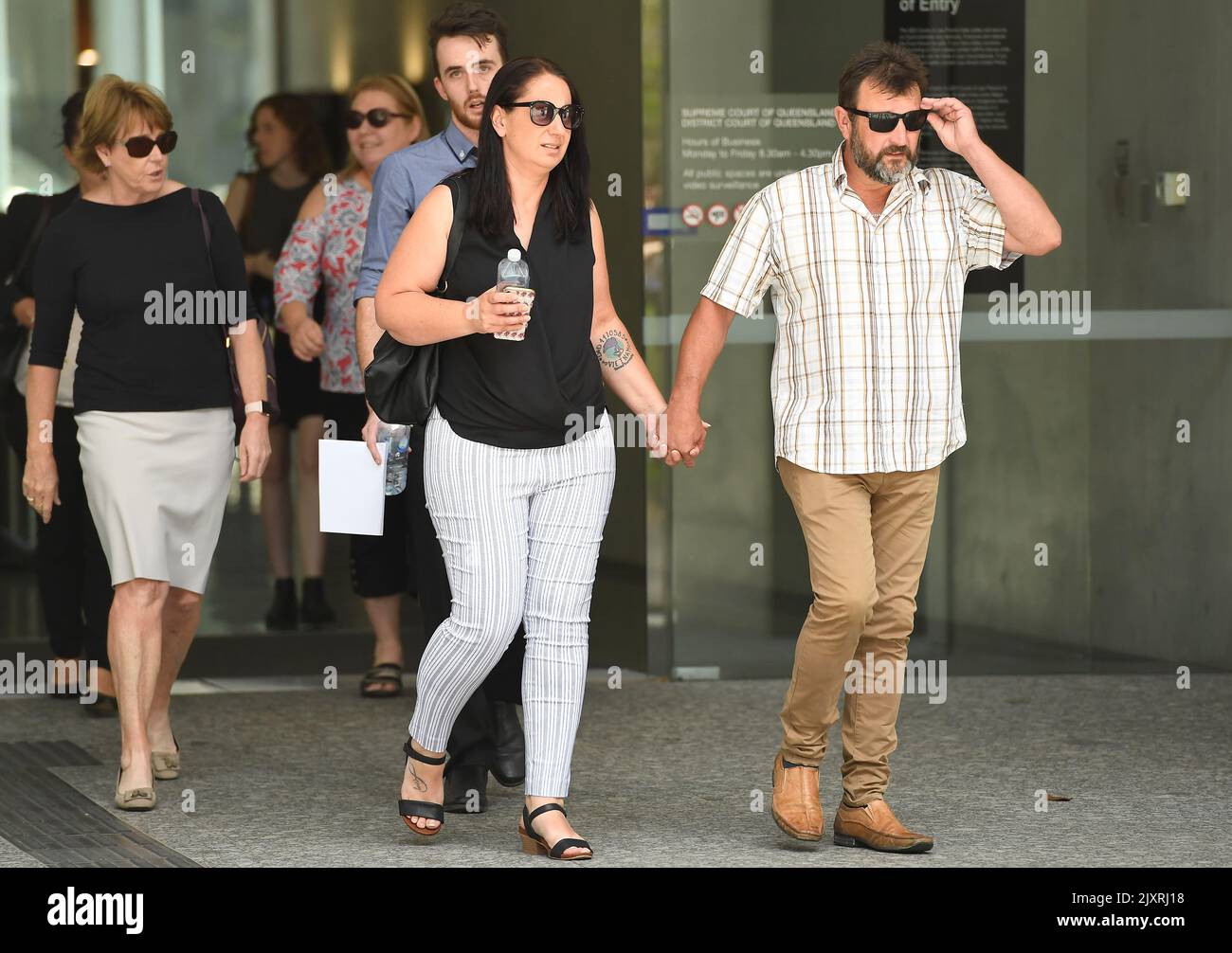 The family and friends of victim Michelle Reynolds are seen leaving the ...