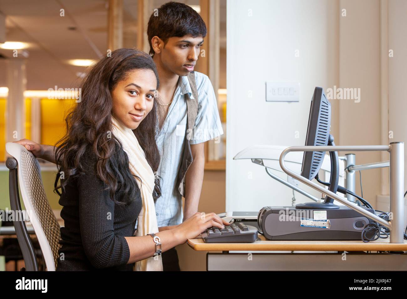 Indian college girl study library hi-res stock photography and images ...
