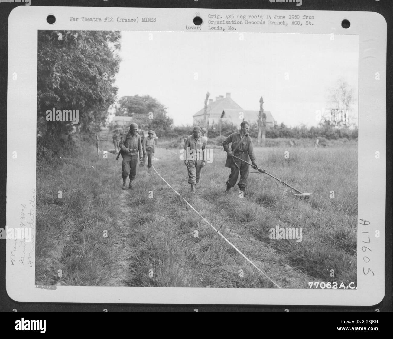 A Field At St. Pierre Du Mont, Normandy, France, Is Searched For Mines ...