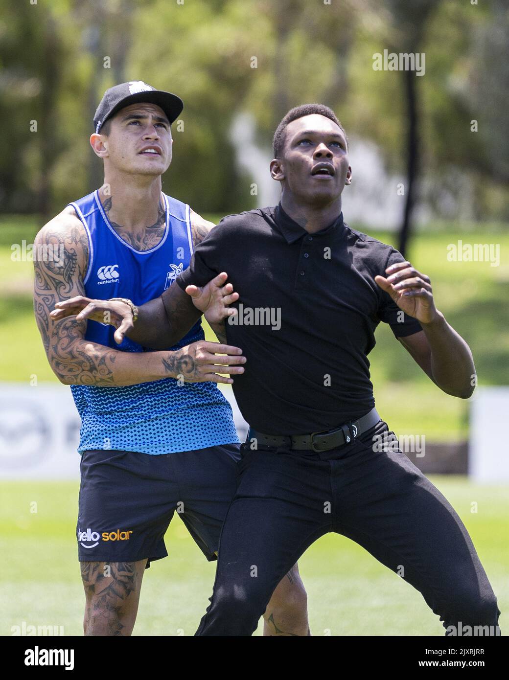 Kangaroos player Marley Williams (left) and UFC Fighter Israel Adesnya ...