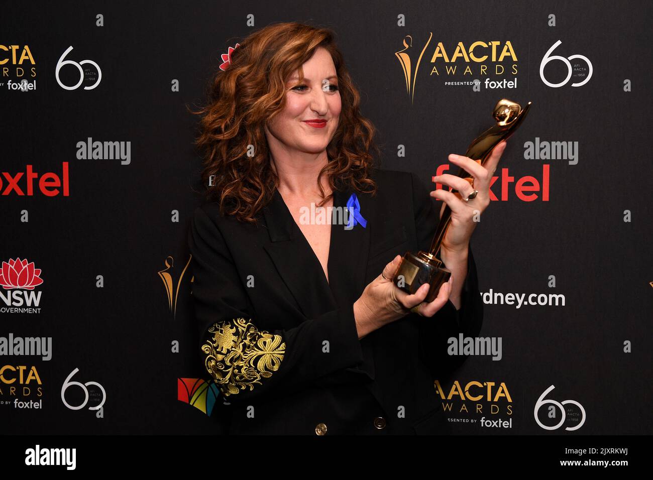 Kate Box poses for a photograph after winning the award for Best Lead ...