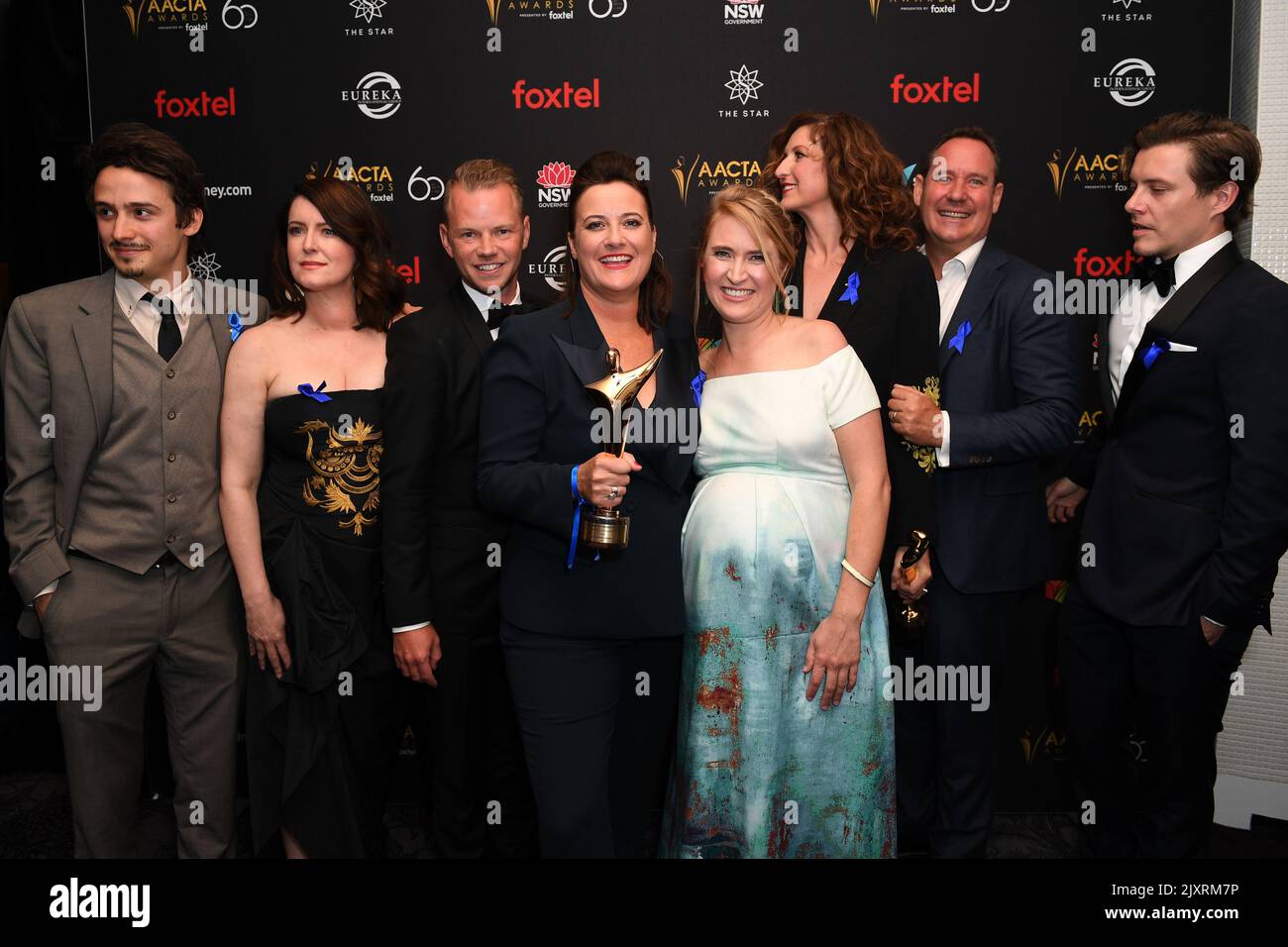 The cast of RIOT pose for a photograph after winning the award for Best ...