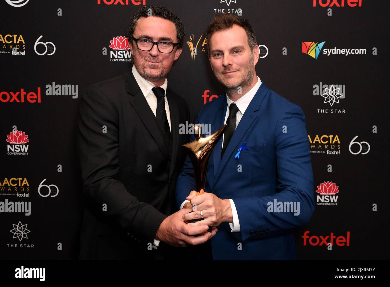Paul Damien Williams and Shannon Swan pose for a photograph after ...