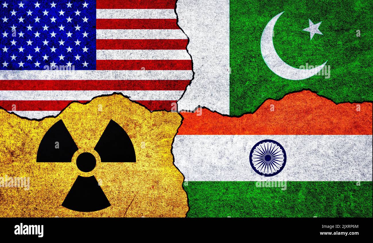 Flags of USA, India, Pakistan and radiation symbol on a wall. United ...
