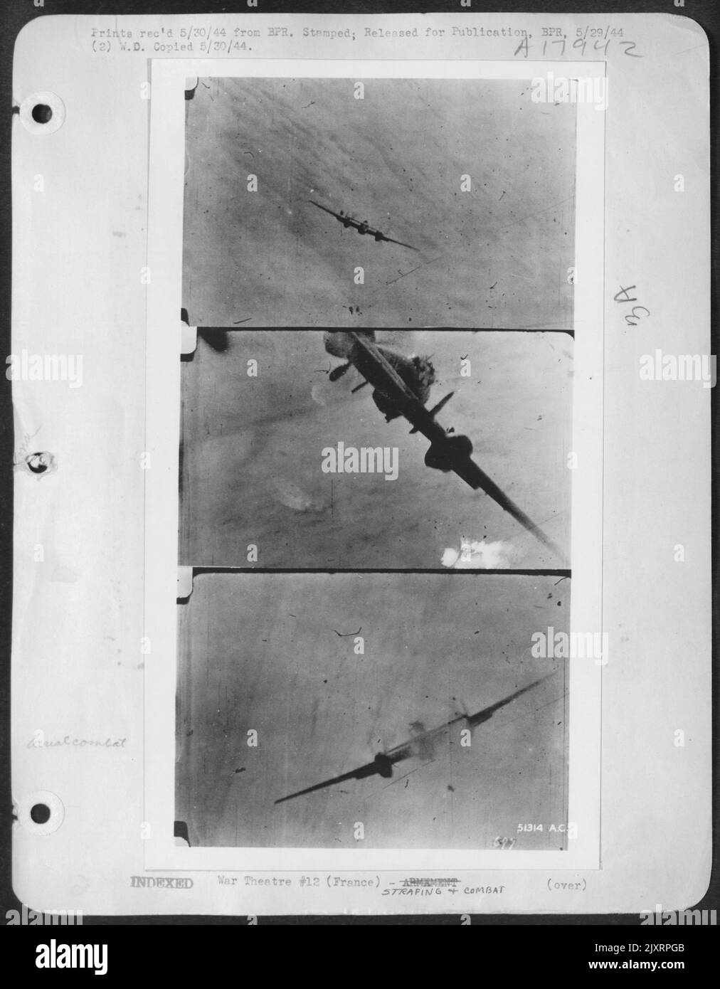 The finis of a German ME-110 fighter plane is told in these pictures ...
