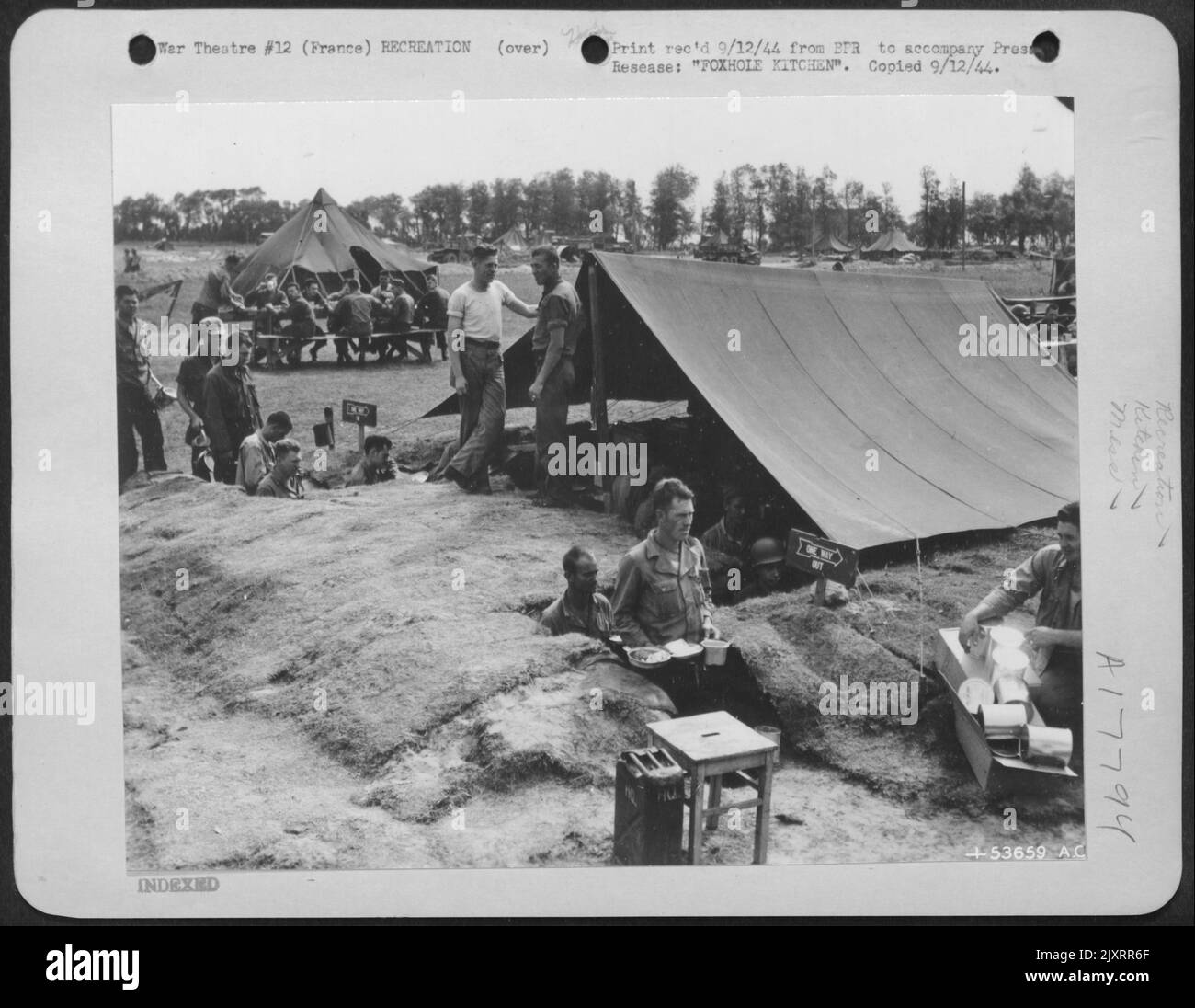 FOXHOLE KITCHEN-As protection against strafing by the Luftwaffe, this ...