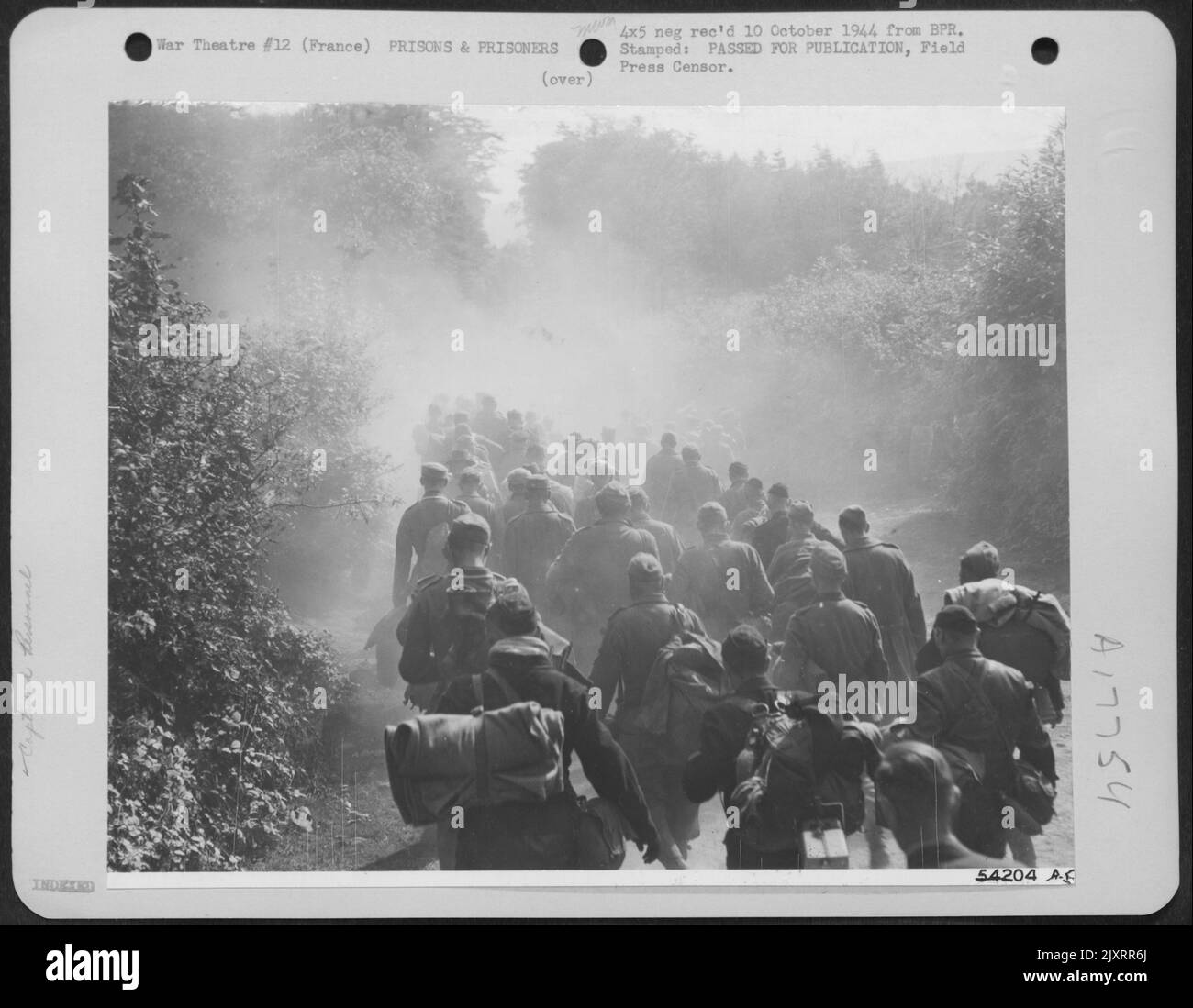 France-This photo, showing German prisoners slogging to the stockades ...