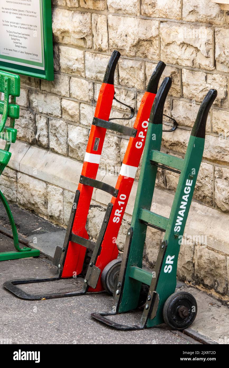 vintage railway porters trolleys and baggage trucks on the platfrom at ...