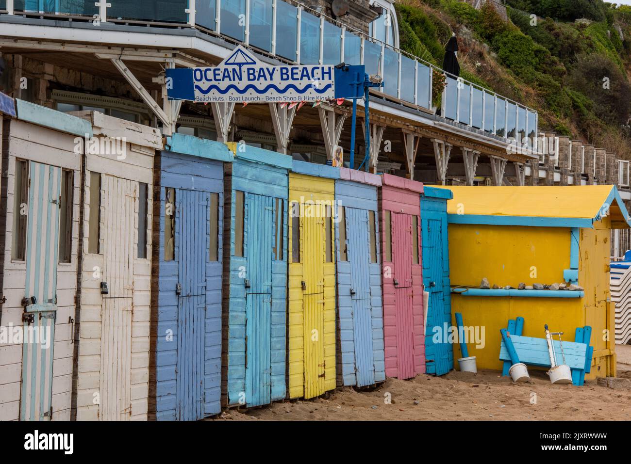 colourful beach huts on the sandy seaside beach at wareham in dorset uk ...