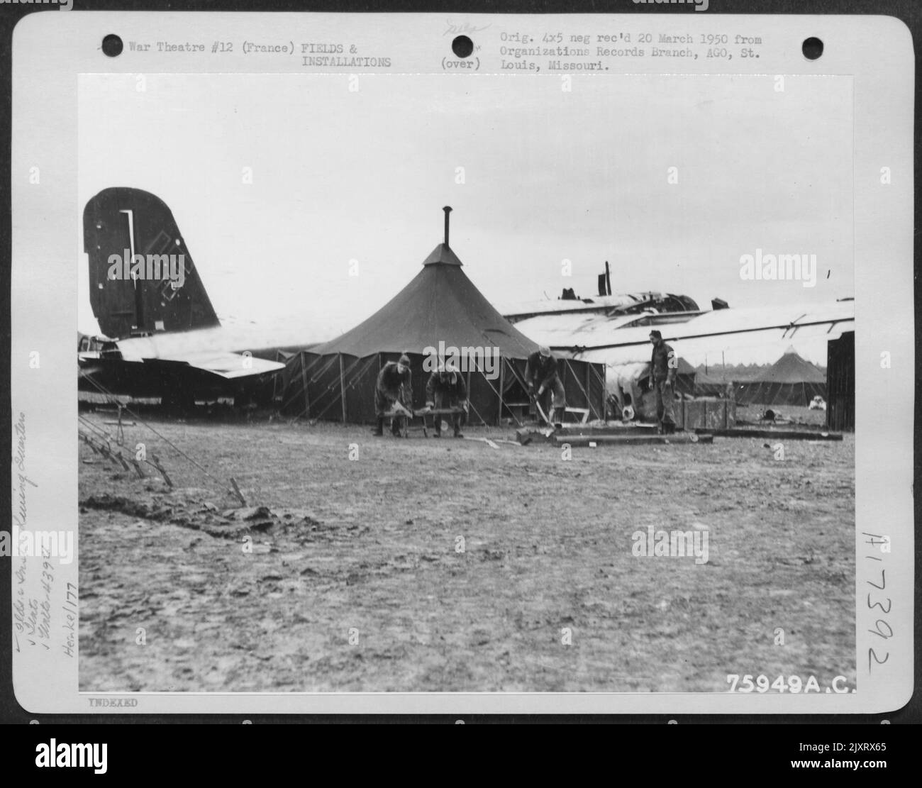 With A Captured German Plane As A Background, Members Of The 439Th ...