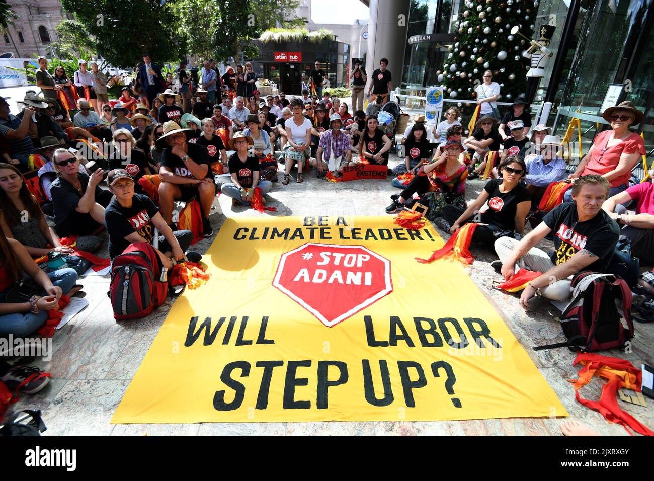 Anti Adani coal mine protestors engage in a sit-in protest outside the ...