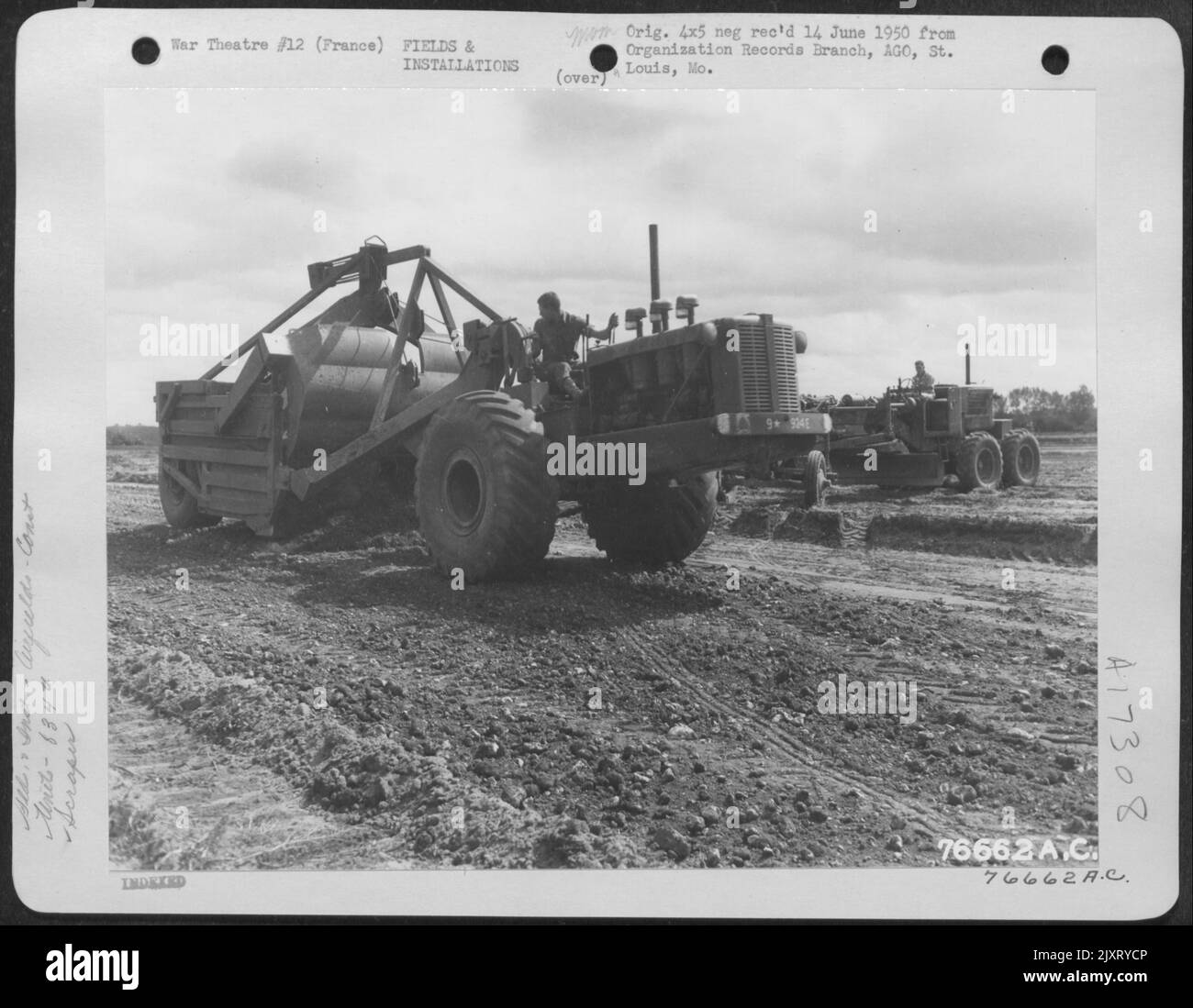 A Scraper Operated By A Member Of The 834Th Engineer Aviation Battalion ...
