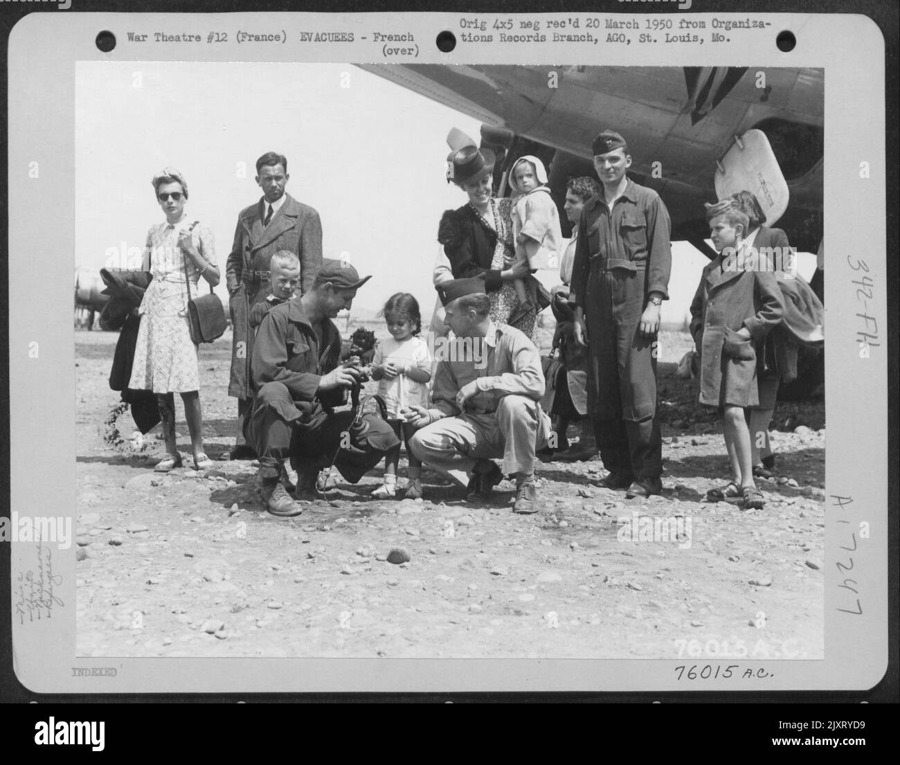 Members Of The 92Nd Bomb Group Pose With French Refugees Beside The ...