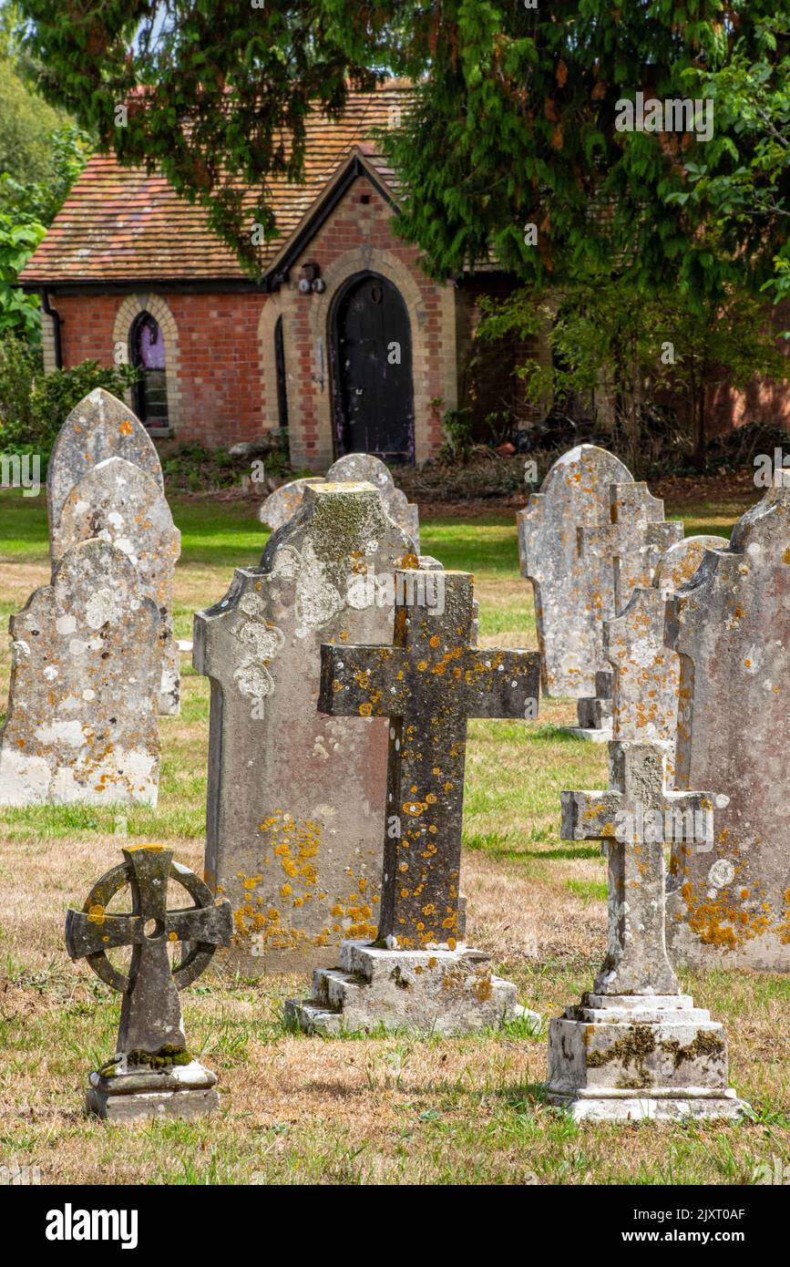 graveyard or cemetery with stone headstones and epitaphs, historic ...