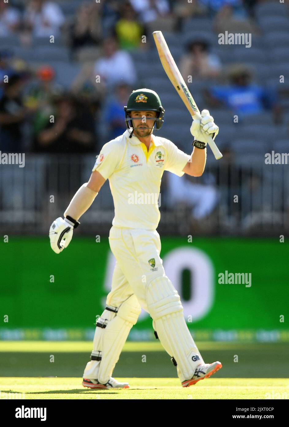 Australian batsman Travis Head reacts after reaching his half century ...
