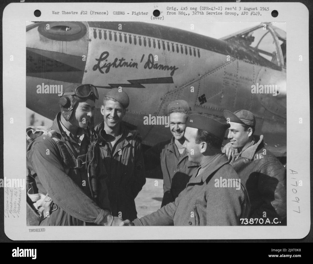 Standing Beside His Lockheed P-38 'Lightnin' Danny', At An Air Base ...