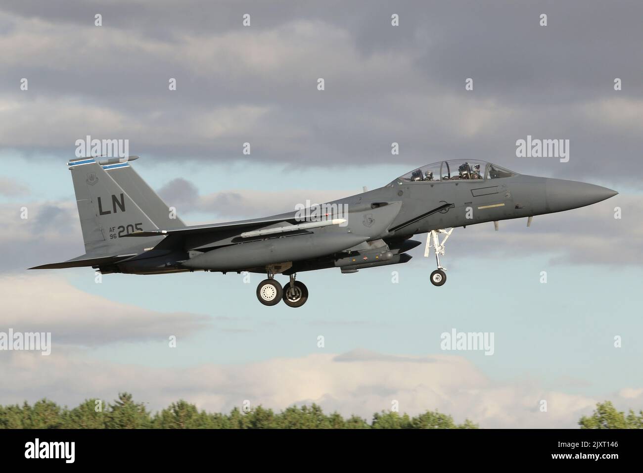 48th Fighter Wing F-15E returning to RAF Lakenheath against a moody sky ...