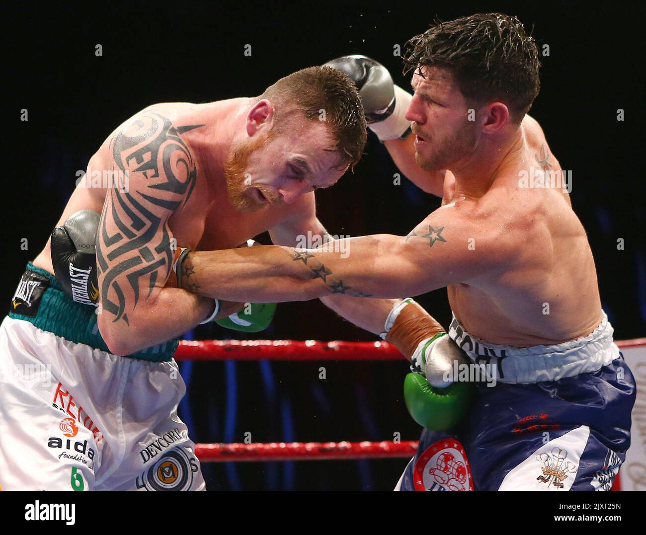 Boxer Dennis Hogan and Jamie Weetch in action during the All Or Nothing ...