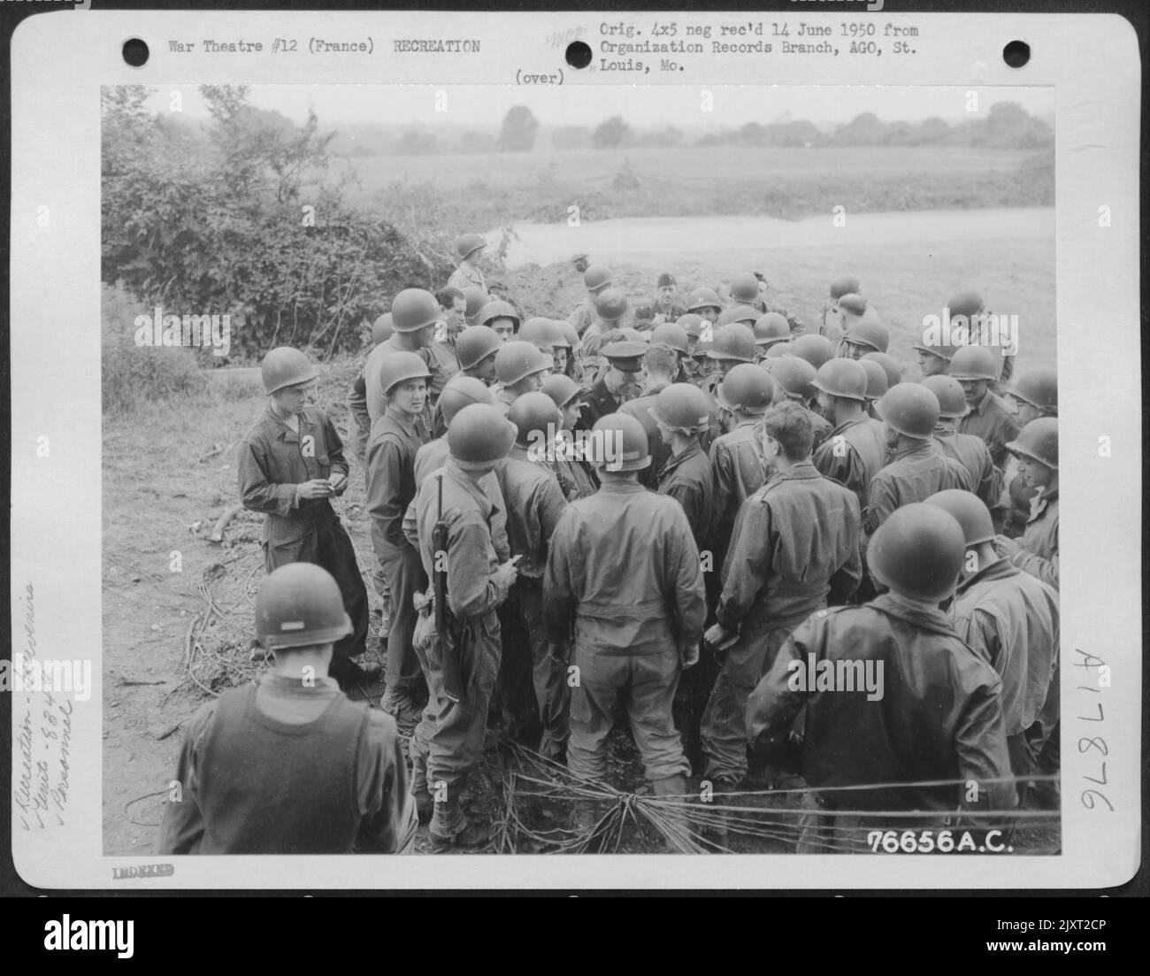 Men Of The 834Th Engineer Aviation Battalion Gather Around The Famous ...