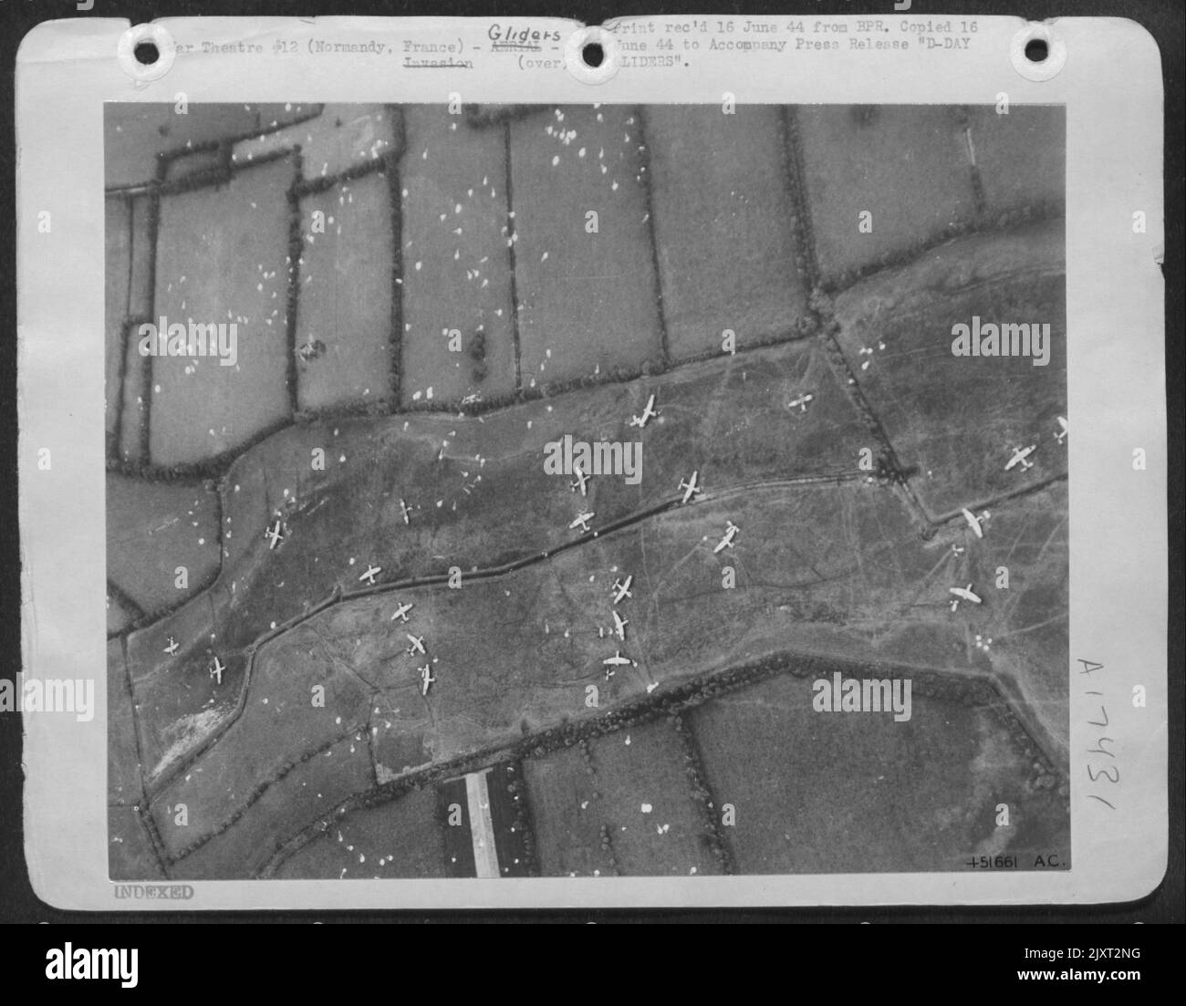 These are gliders and parachutes left on a Normandy field on D-Day by ...