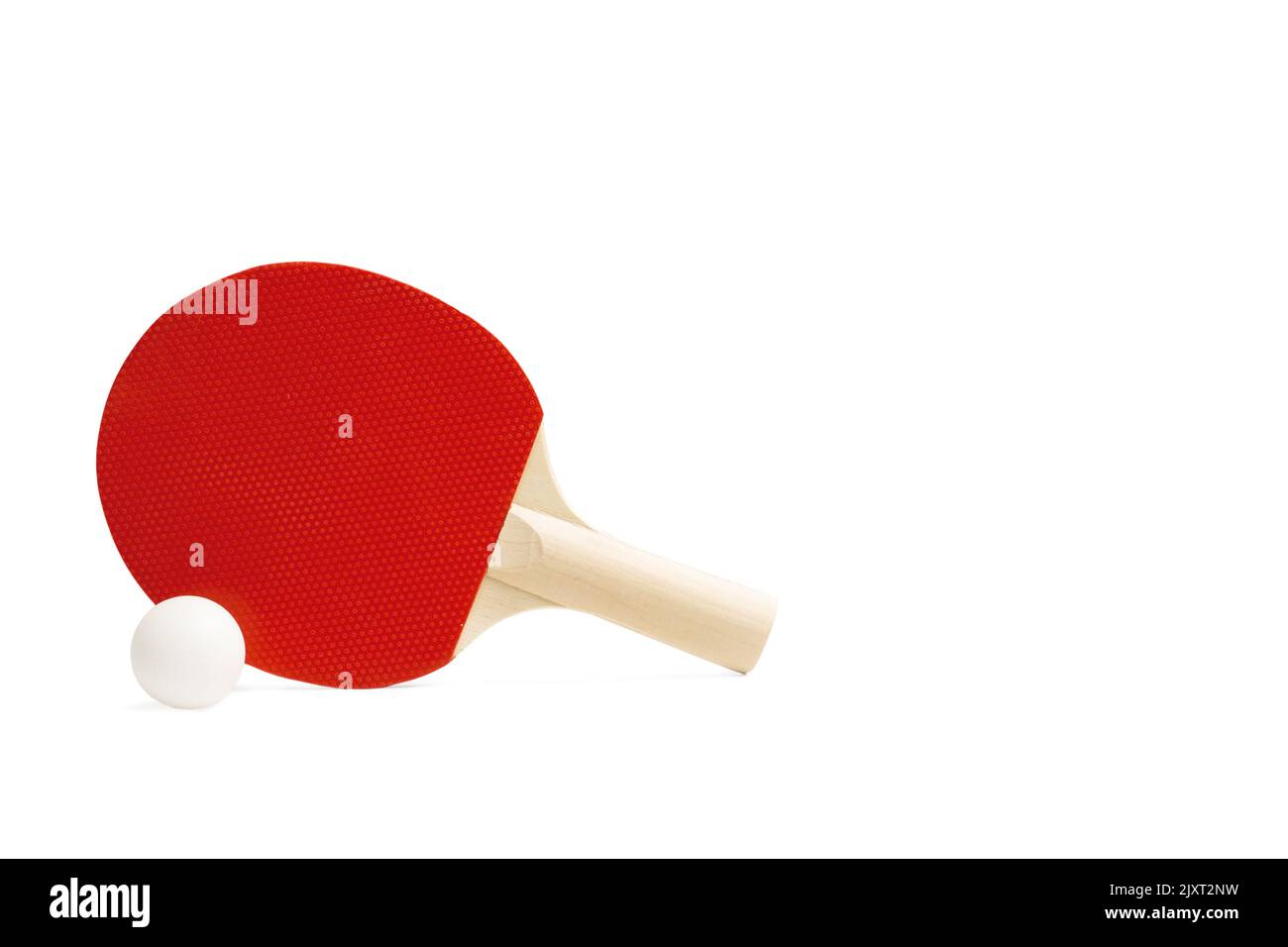 Red ping pong paddle and a white ball on a white background with copy ...