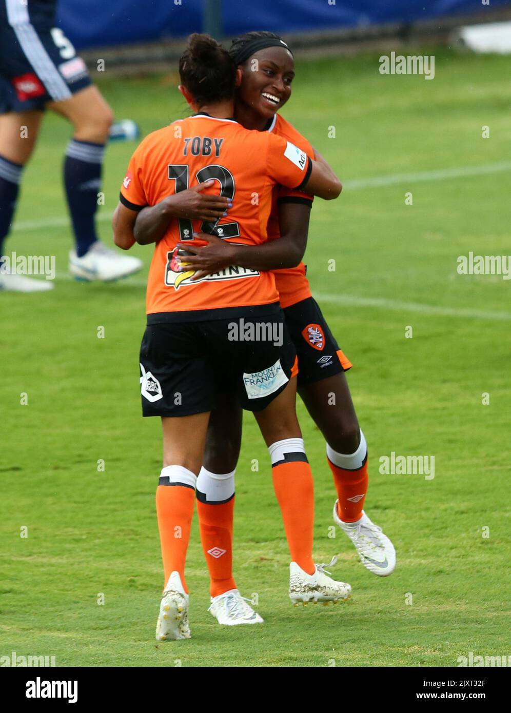 Chioma Ubogagu of the Roar celebrates her goal with Allira Toby during ...