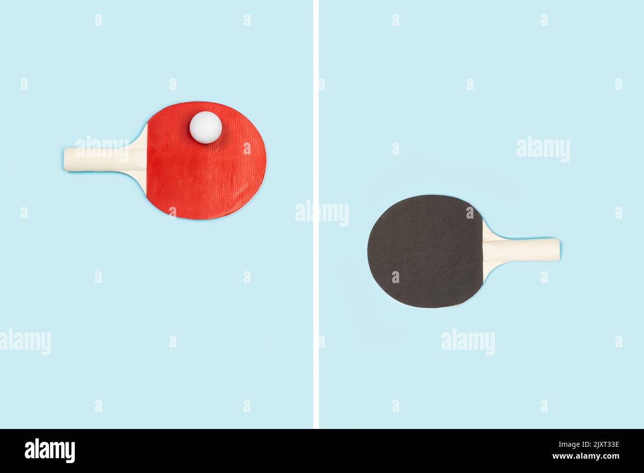 Red and black ping pong paddles with a white ball on a light blue ...