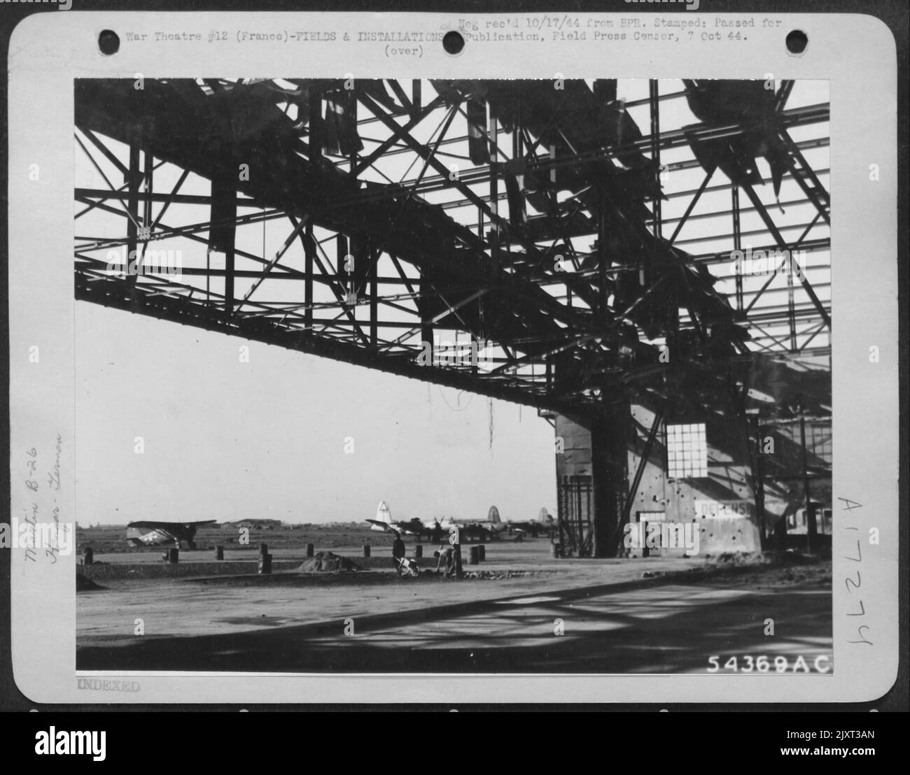 Two 9th Air Force Martin B-26 Marauder bombers are shown on a runway of ...