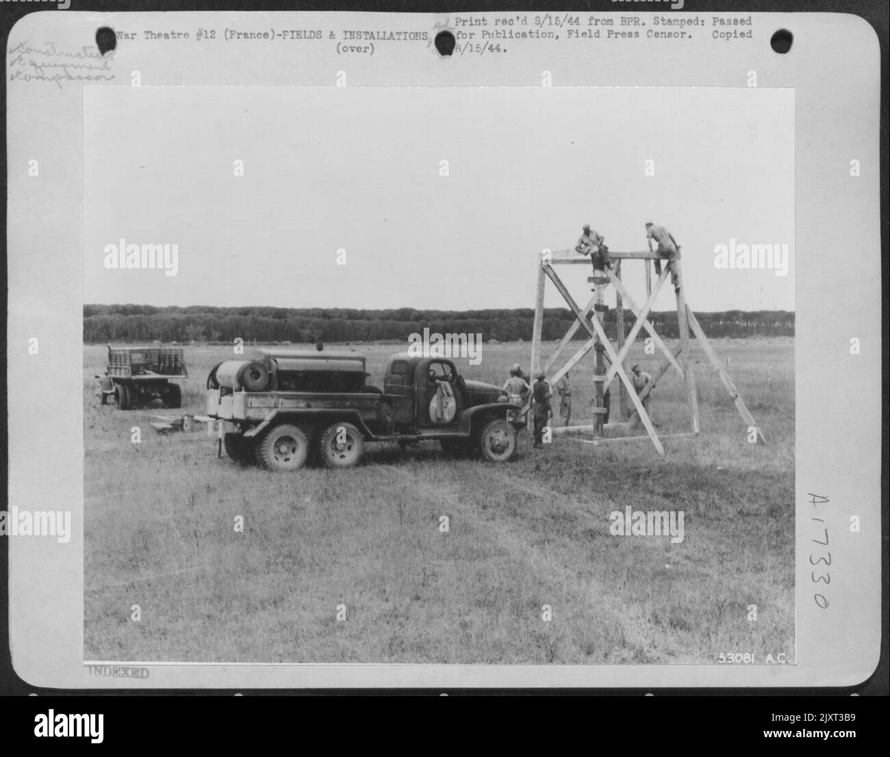 Carpenters go to work with pneumatic tools constructing the control ...
