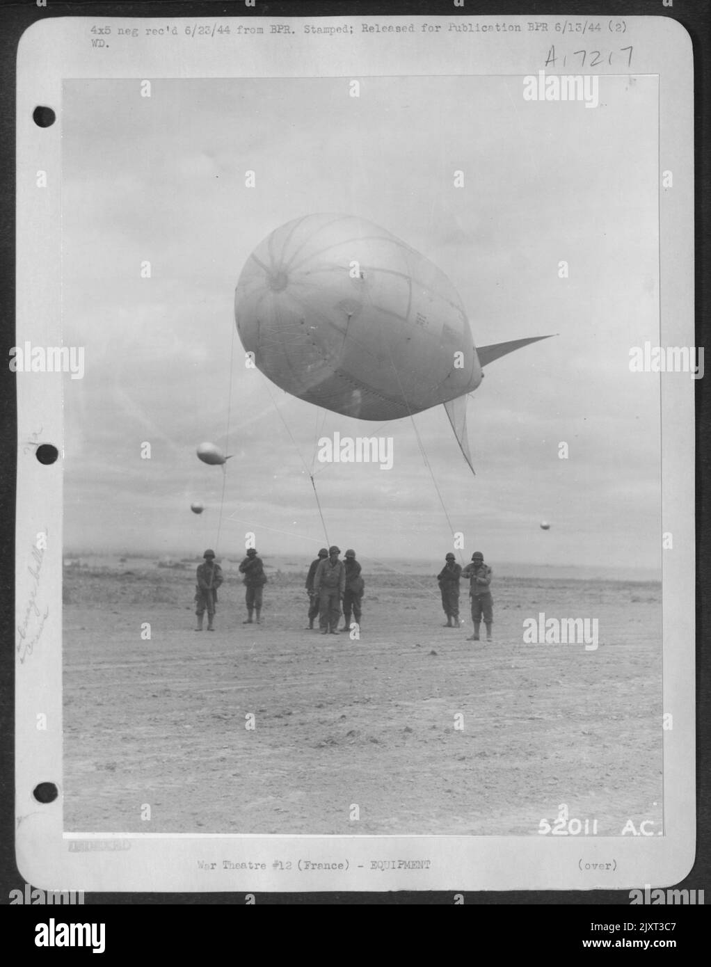 for protection against enemy strafing on the French coast, these men of ...