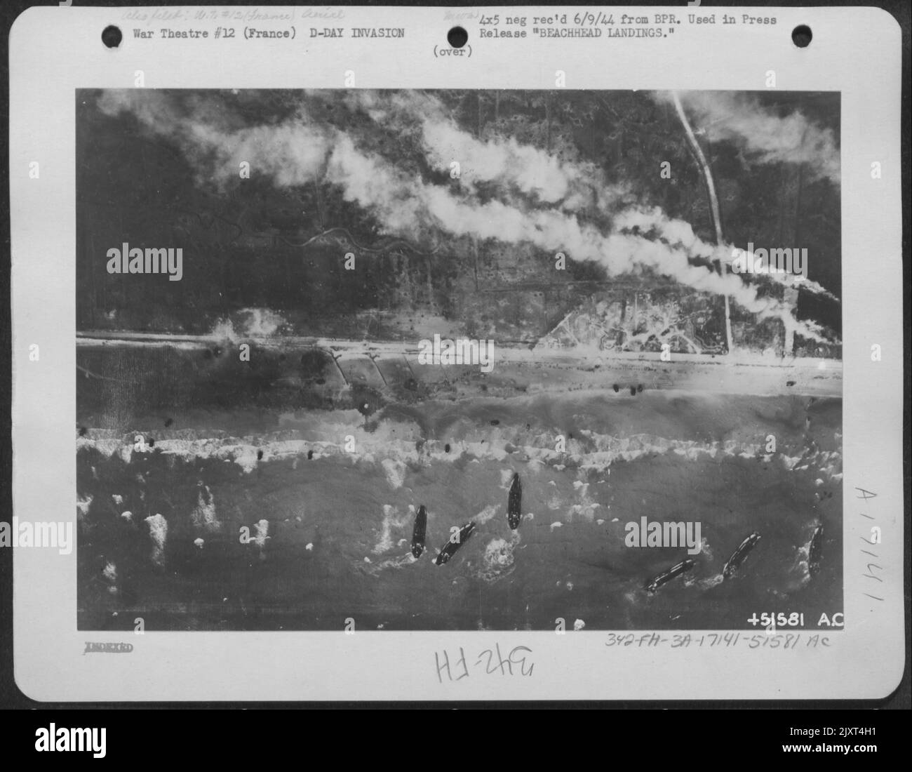 BEACHHEAD LANDINGS. Men and assault vehicles storm the beaches of ...