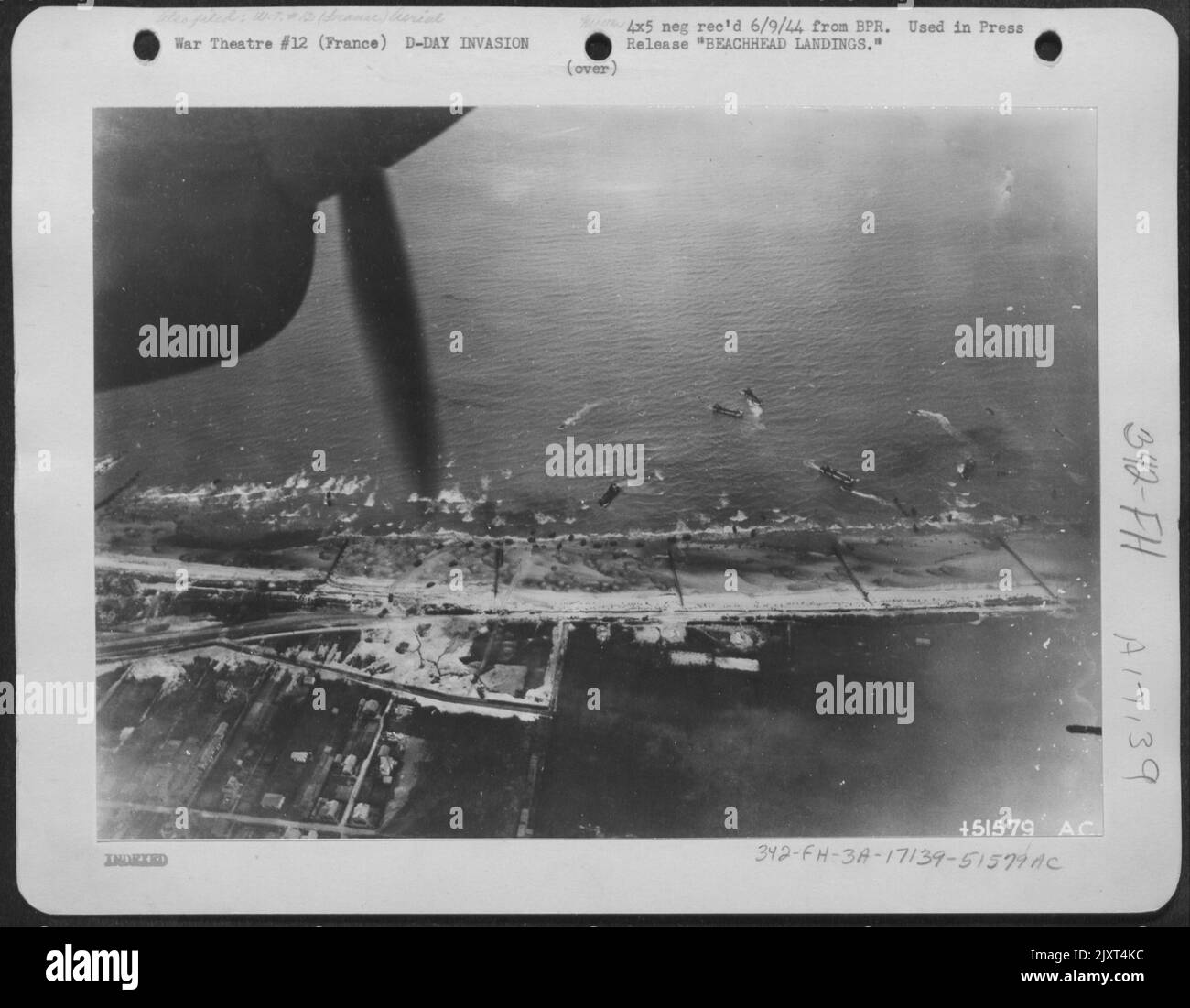 FRANCE-BEACHHEAD LANDINGS-Men and assault vehicles storm the beaches of ...