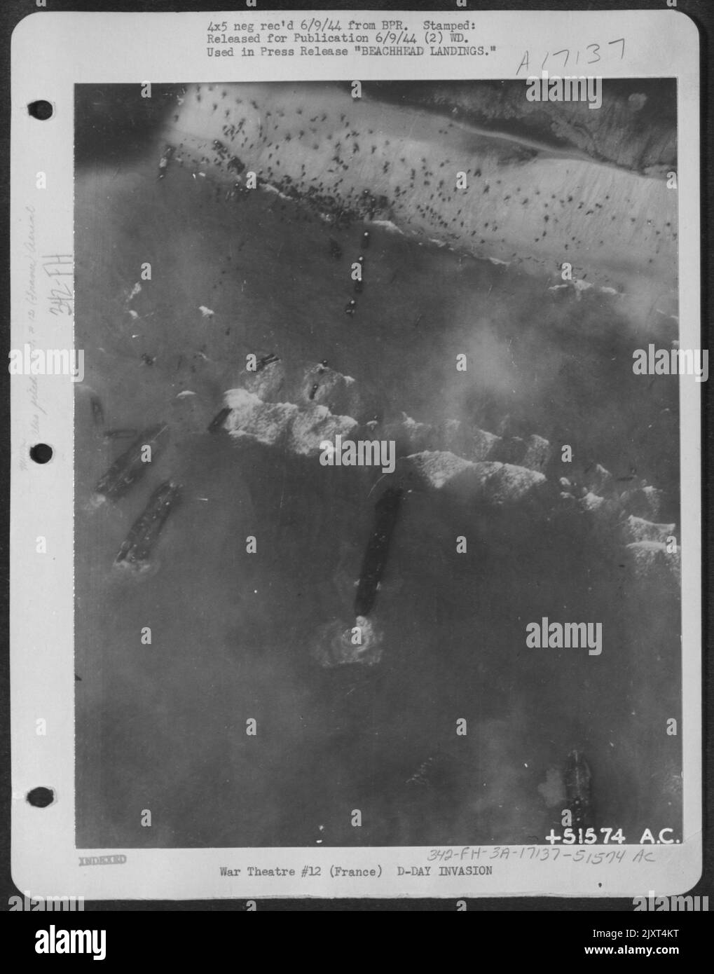 BEACHHEAD LANDINGS-Men and assault vehicles storm the beaches of ...