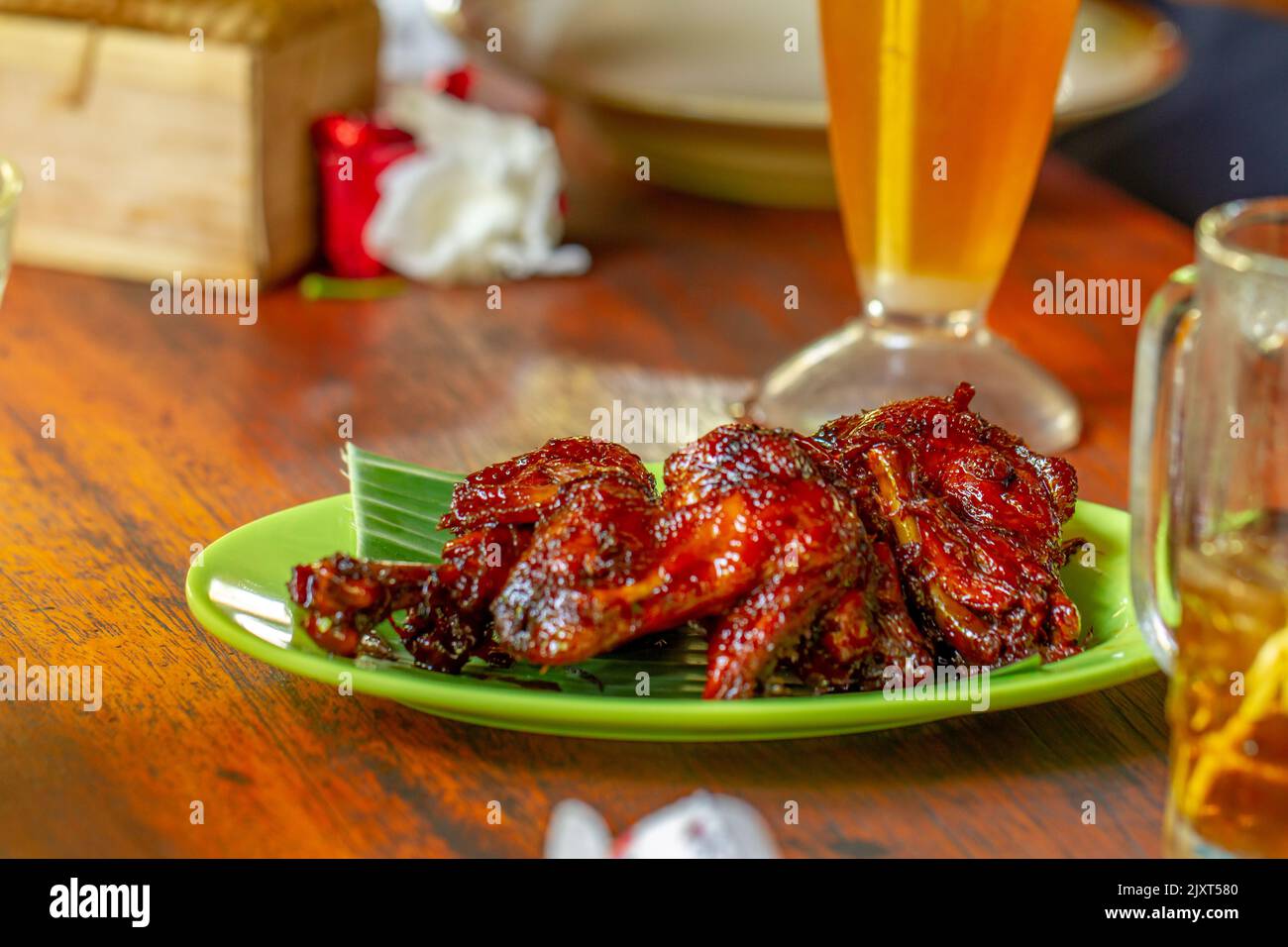 Local chicken fried with soy sauce, looks shiny and wet with spices ...