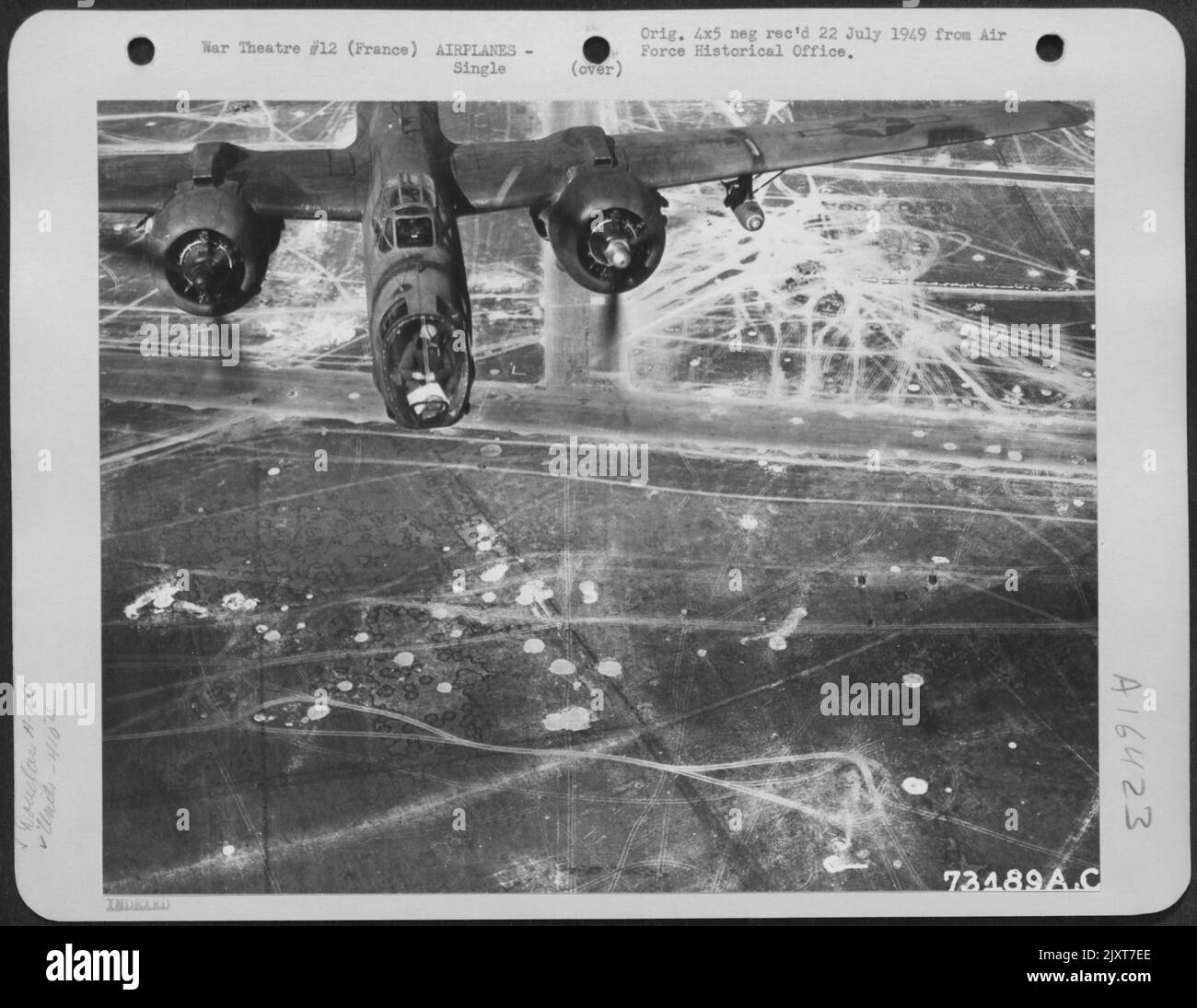 A Douglas A-20 Of The 410Th Bomb Group Flies Over A Pock-Marked ...