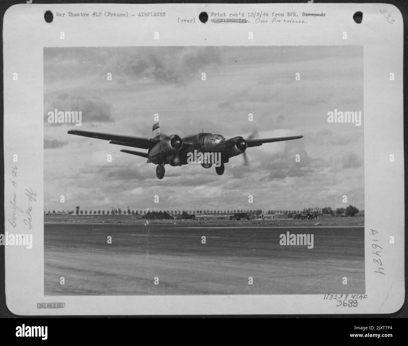 An Douglas A-26 "B" Soars Into The Air From A Landing Strip Somewhere ...