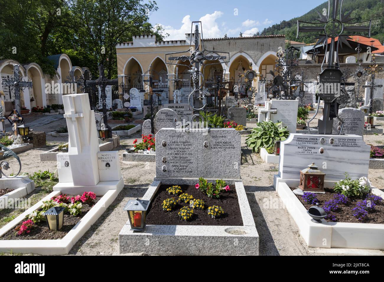Cemetery iwith marble and granite grave edging in Malles Venosta, Italy ...