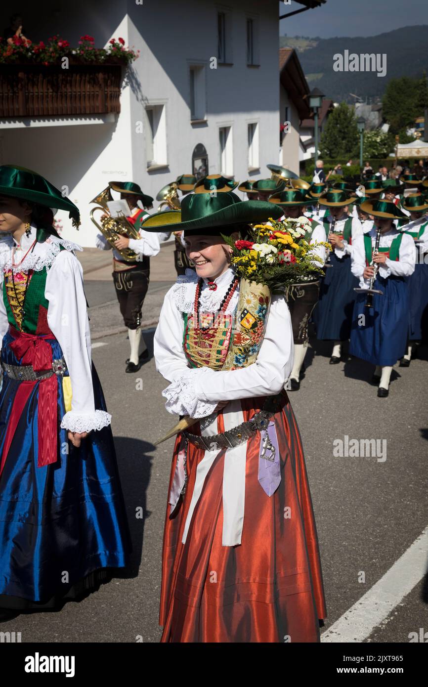 Women wearing traditional local period costume of wide brimmed hats and ...