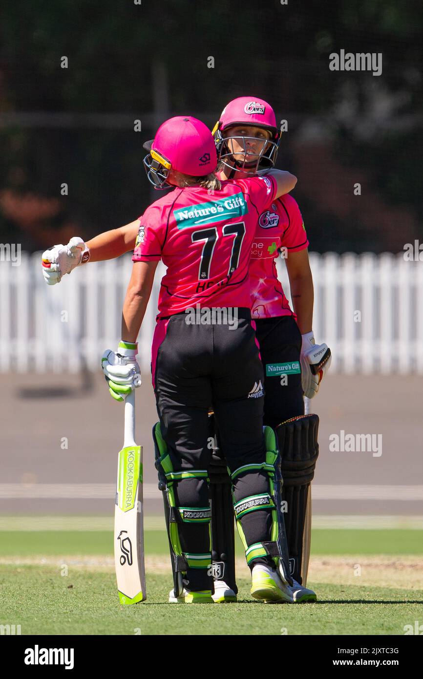 Ashleigh Gardner and Alyssa Healy of the Sixers hug during the Women's ...
