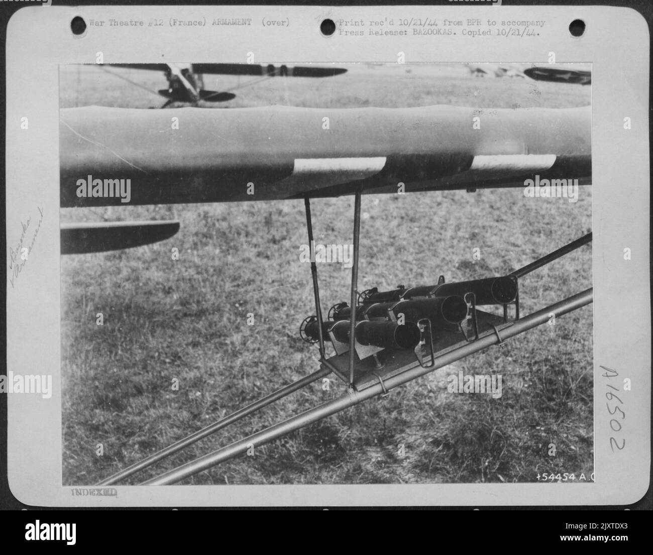 This is a muzzle end view of three bazooka guns mounted on the wing ...