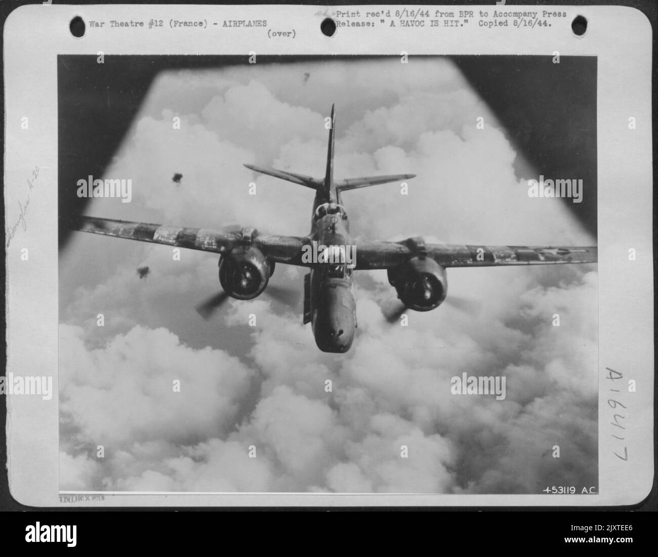 A Douglas A-20 Havoc light bomber of the 9th USAAF is seen over enemy ...
